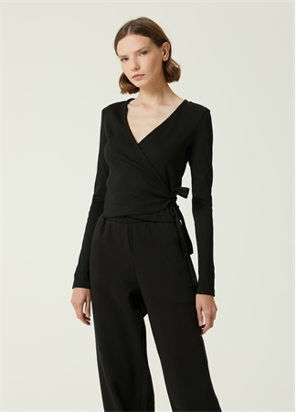 Puma Kadın Classics Ribbed Siyah Kruvaze Bluz XS EU Puma Kadın Classics Ribbed Siyah Kruvaze Bluz XS EU