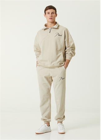 Rhude Erkek Ekru Beli Kordonlu Logolu Jogger Eşofman Altı Beyaz S EU Rhude Erkek Ekru Beli Kordonlu Logolu Jogger Eşofman Altı Beyaz S EU